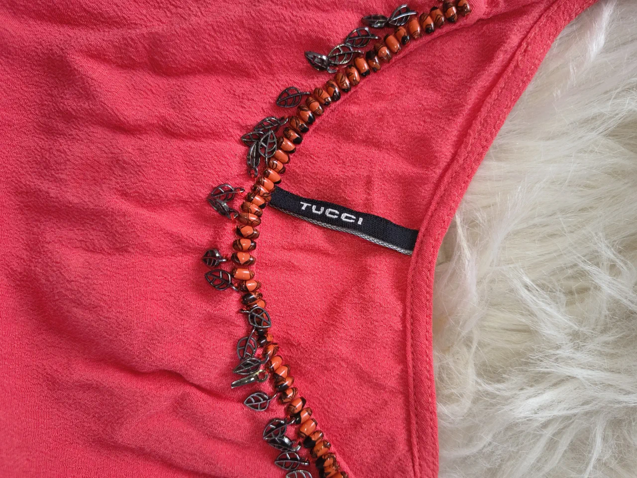 Musculosa Tucci | EXTRA